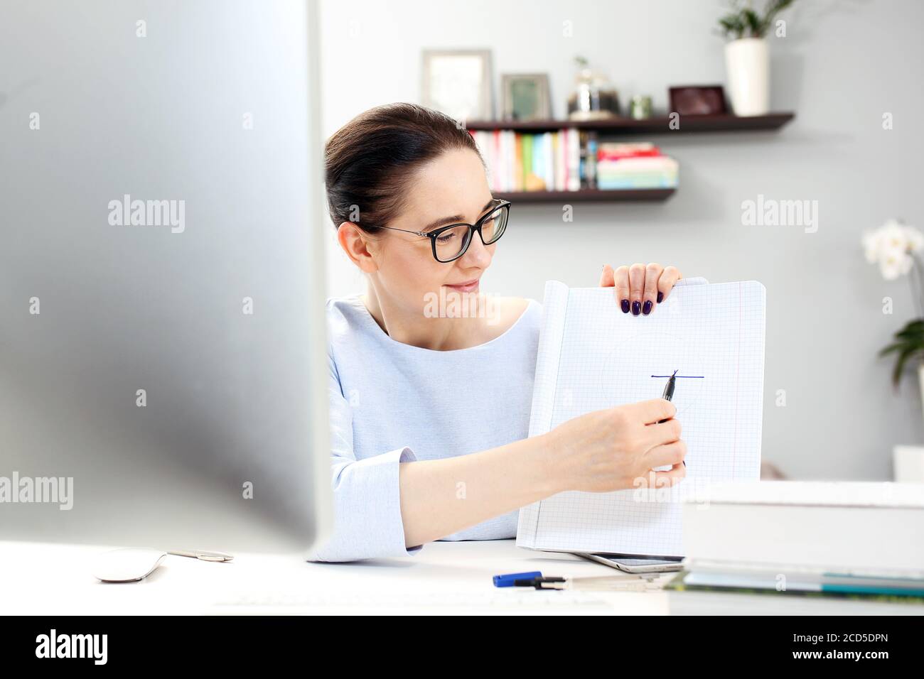 Online lesson.E-learning. The teacher conducts the lesson online Stock Photo - Alamy