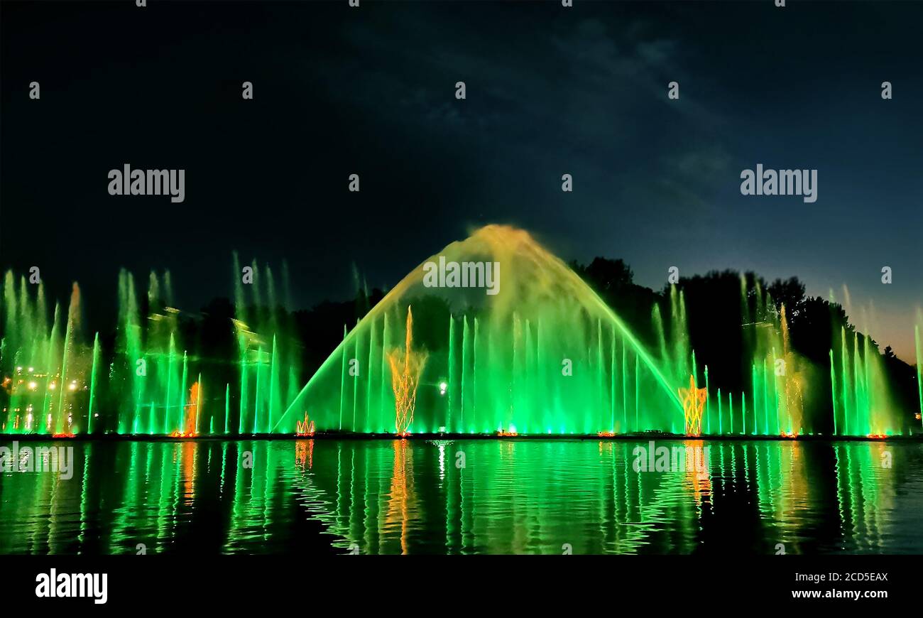 Night laser fountain show, on the Roshen embankment, the Ukrainian city ...