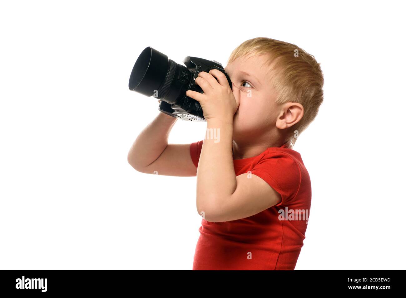 Young blond boy with camera. Portrait, isolated on white background ...