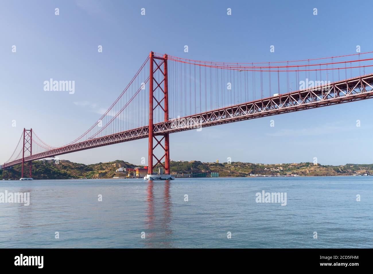 The 25 de Abril Bridge. It is a suspension bridge connecting the city ...