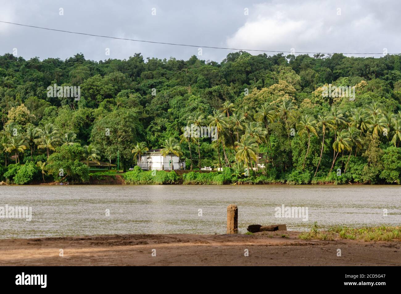 View of Surla Mosque across Mandovi River from Volvoi Ferry Terminal ...