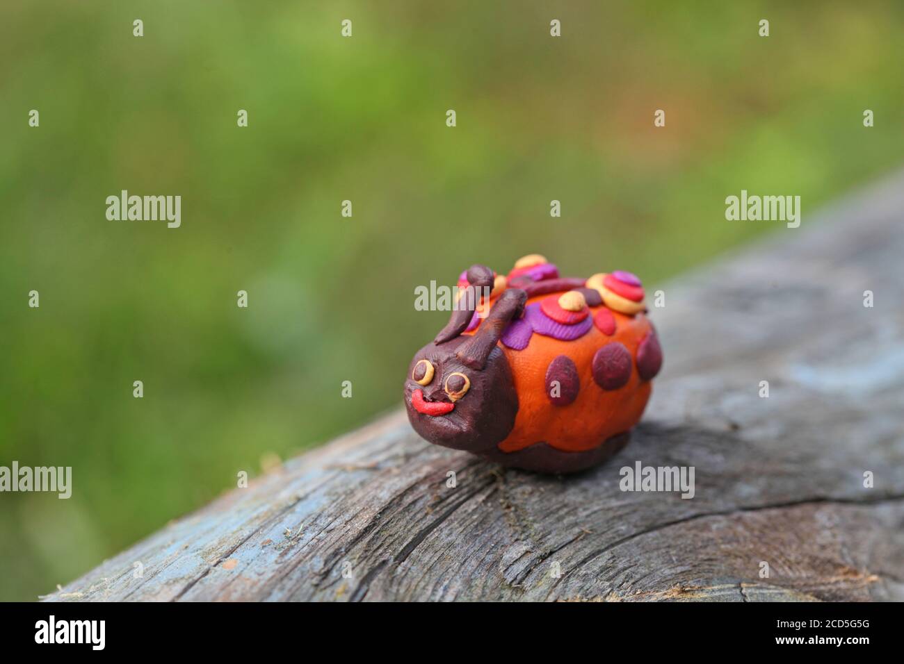 Plasticine world - little hand-made funny bug Stock Photo - Alamy