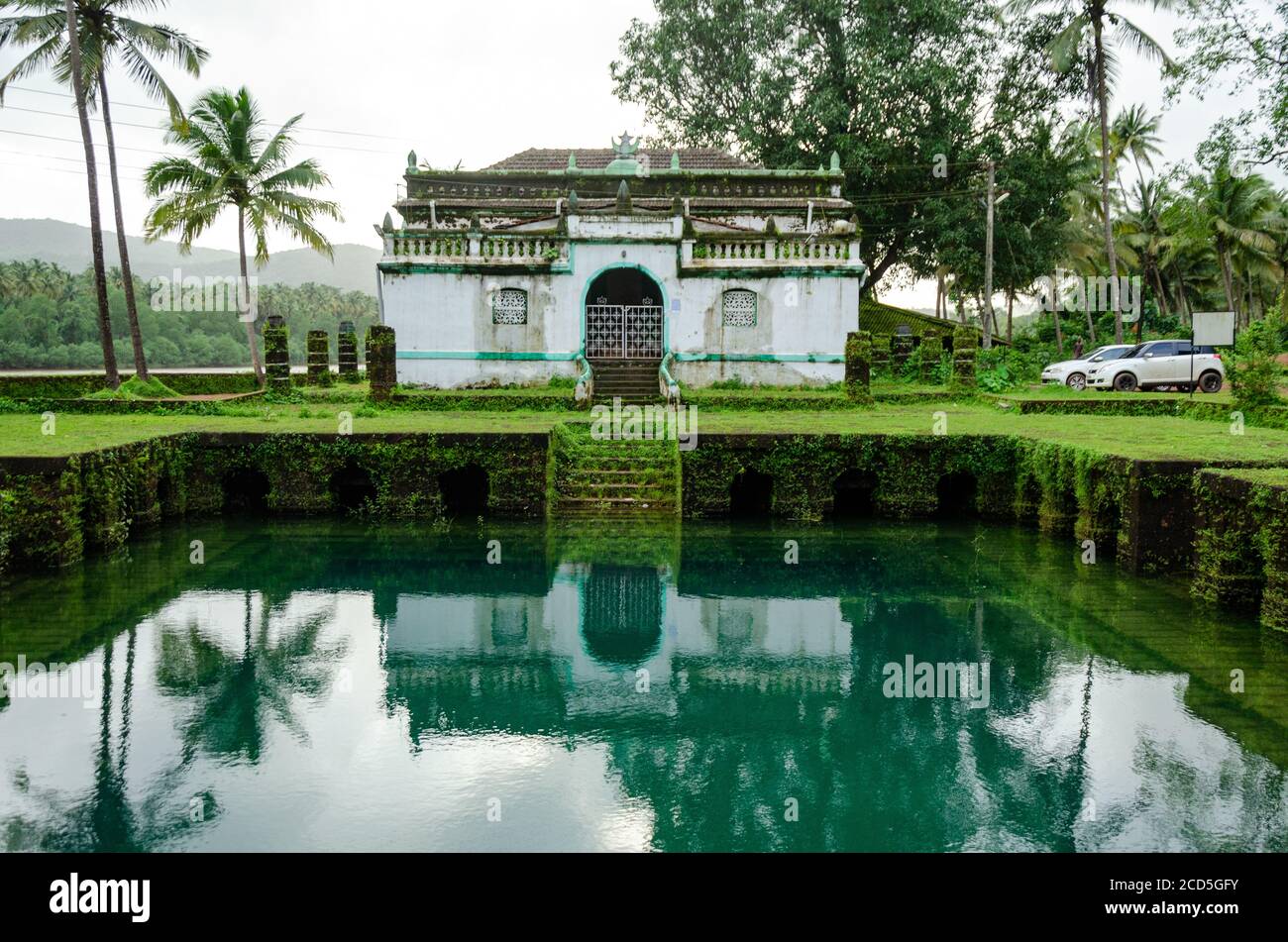 Beautiful view of Surla Mosque and Tank during monsoon season at Surla ...