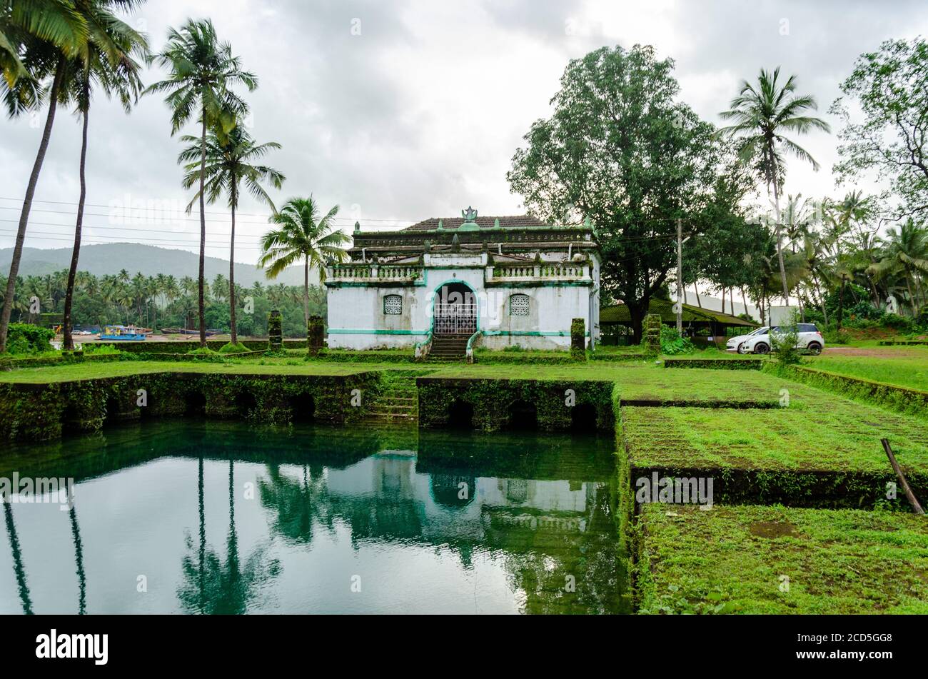 Beautiful view of Surla Mosque and Tank during monsoon season at Surla ...