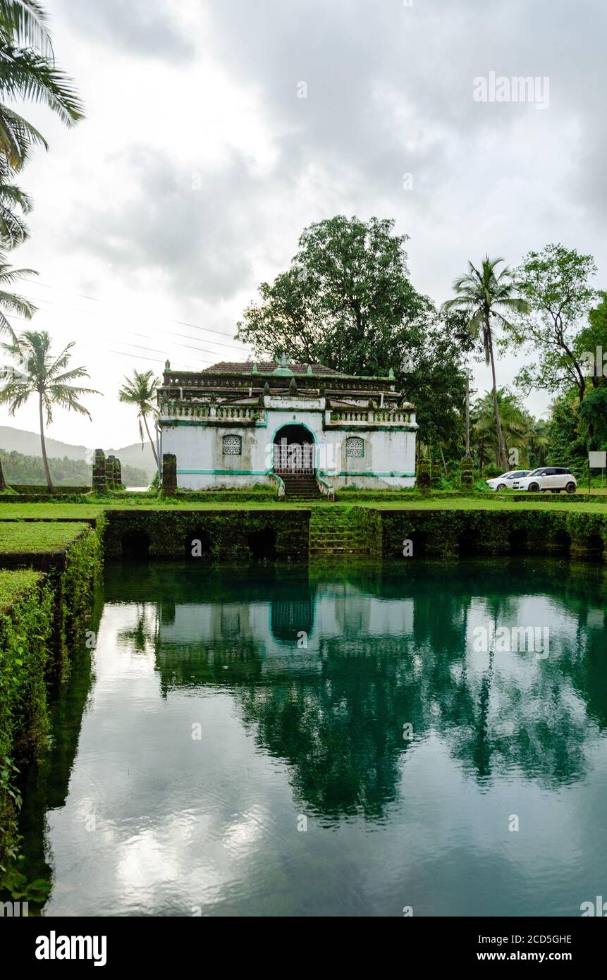 Beautiful view of Surla Mosque and Tank during monsoon season at Surla ...