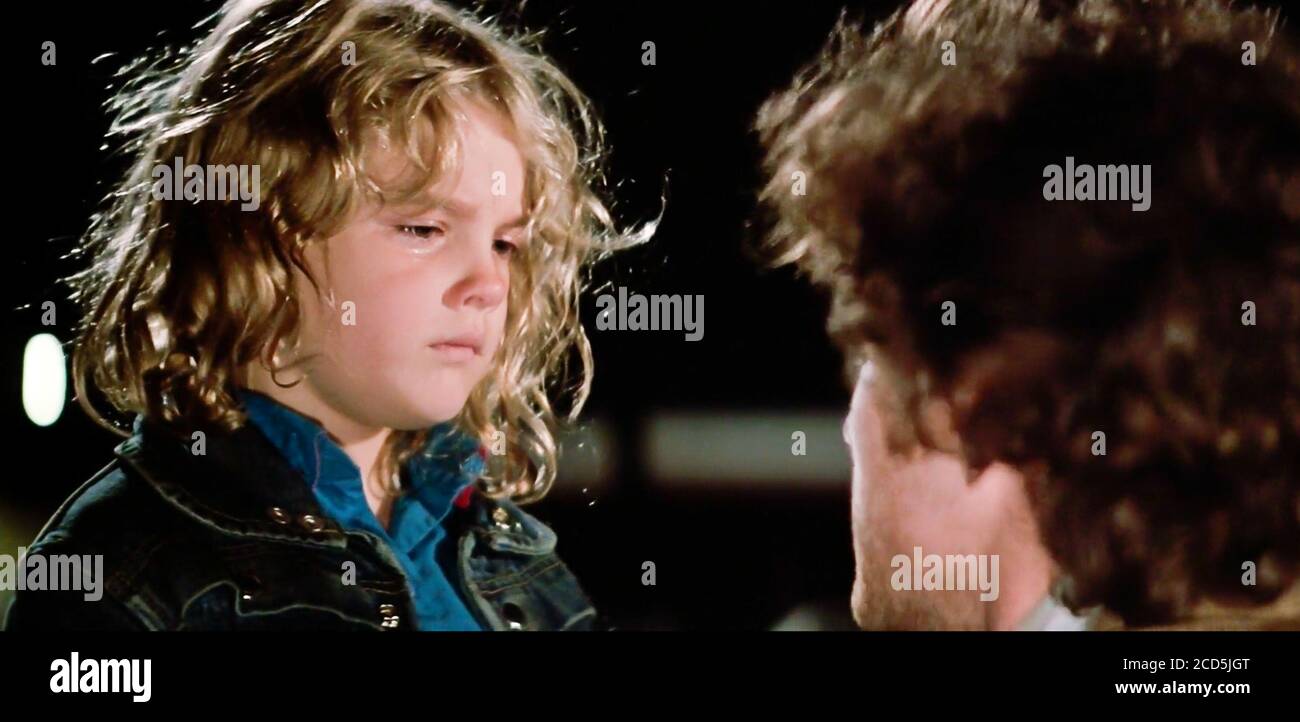 USA. Drew Barrymore and David Keith in the ©Universal Pictures movie : Firestarter (1984). PLOT ...