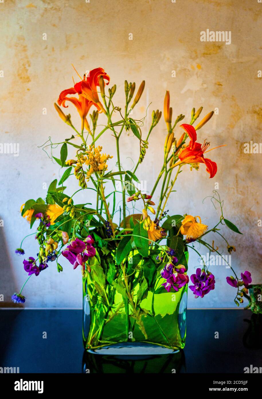 Vase with colorful flowers Stock Photo - Alamy