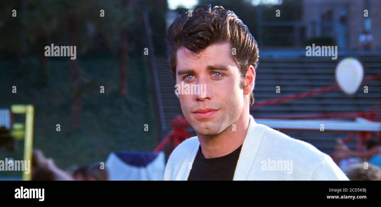 USA. John Travolta in a scene from the ©Paramount Pictures movie: Grease (1978). Plot: Good girl ...