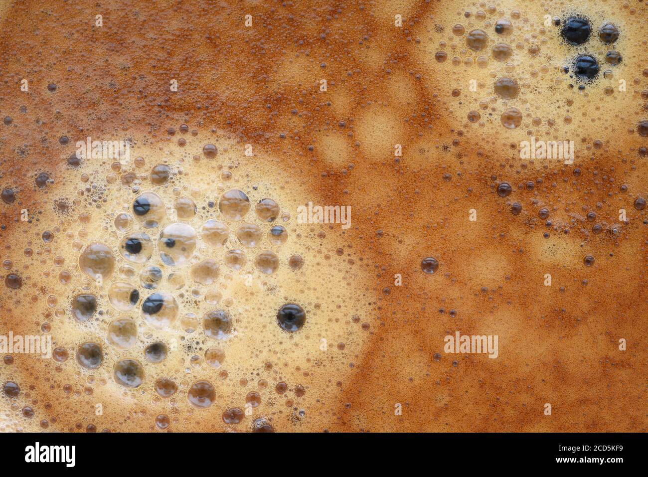 Black coffee with а cream foam texture Stock Photo - Alamy