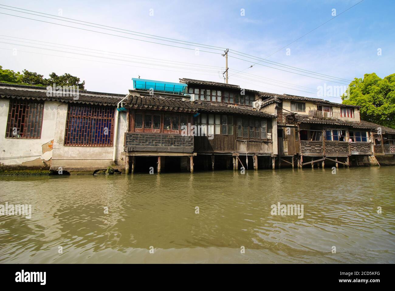 Houses as seen along the picturesque Grand Canal in ancient Suzhou ...