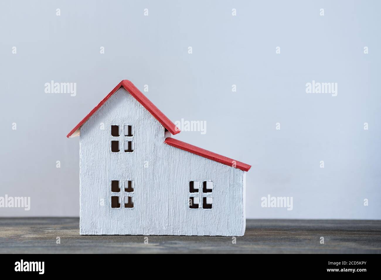 House model on white background. Buying house rent concept. Front view ...