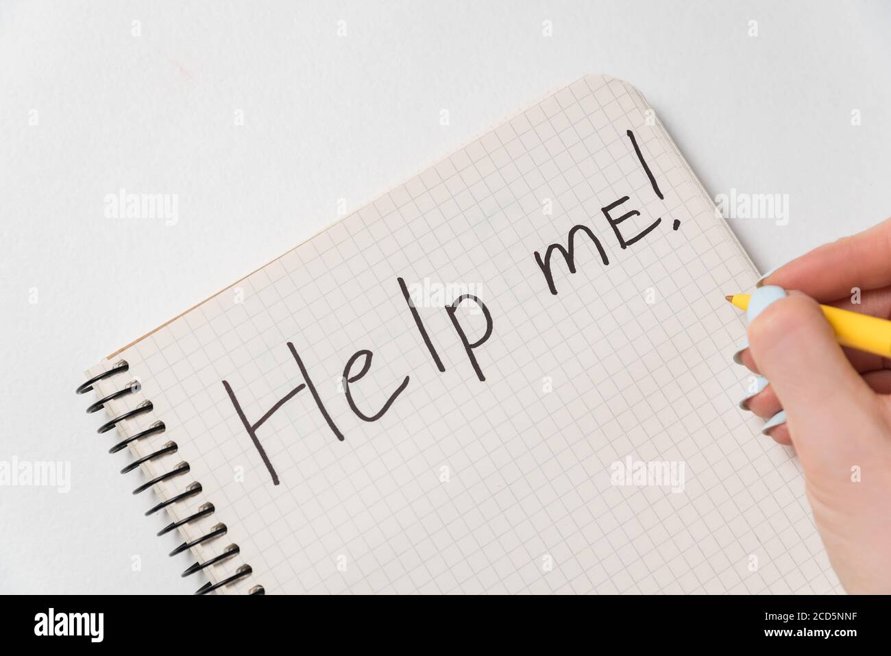 Notepad with words HELP ME on white background. Request for assistance ...