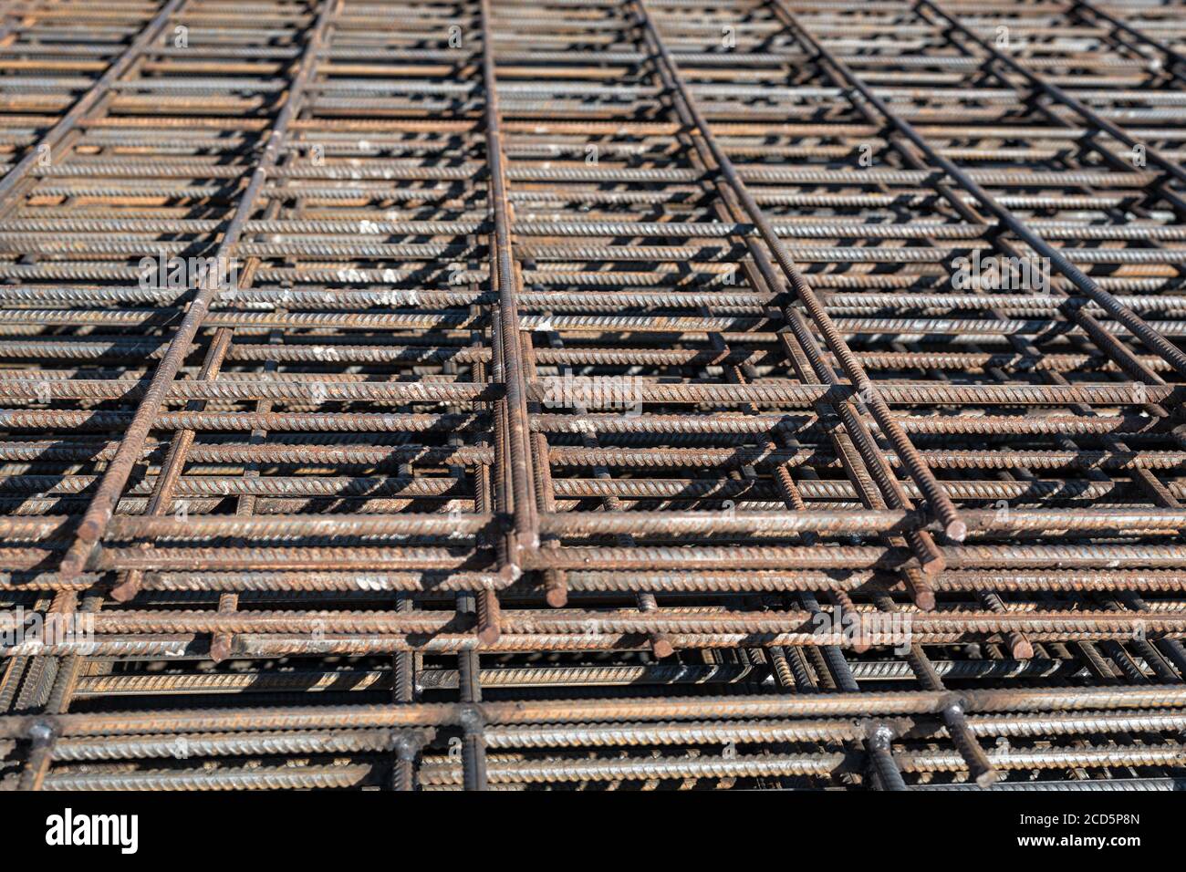 Working material on a construction site. Rusty rebar for concrete ...