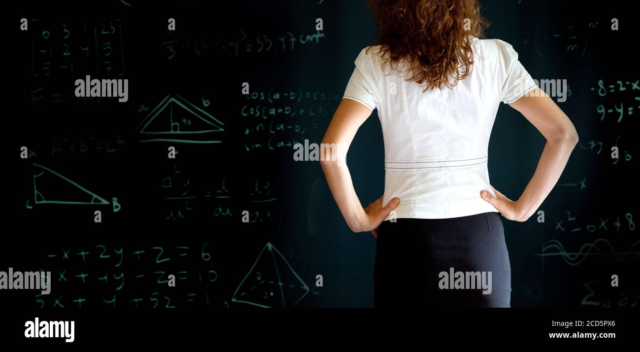 back to school concept teacher in front of chalkboard Stock Photo - Alamy