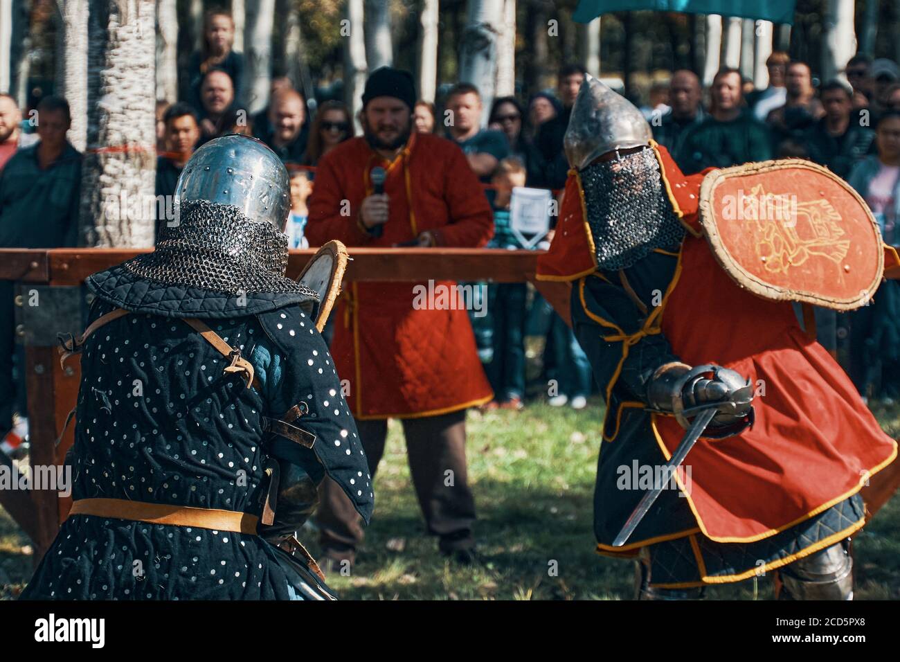 Reconstruction of medieval tournaments of knights. Knights in armor and ...