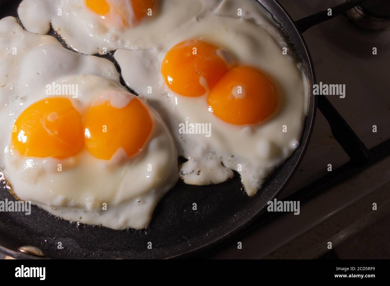 Fried eggs. Two eggs with two yolks Stock Photo - Alamy