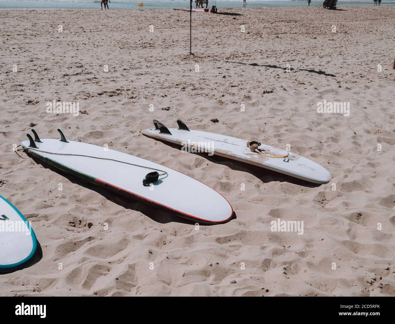 Shot of surfboards on a sand Stock Photo - Alamy