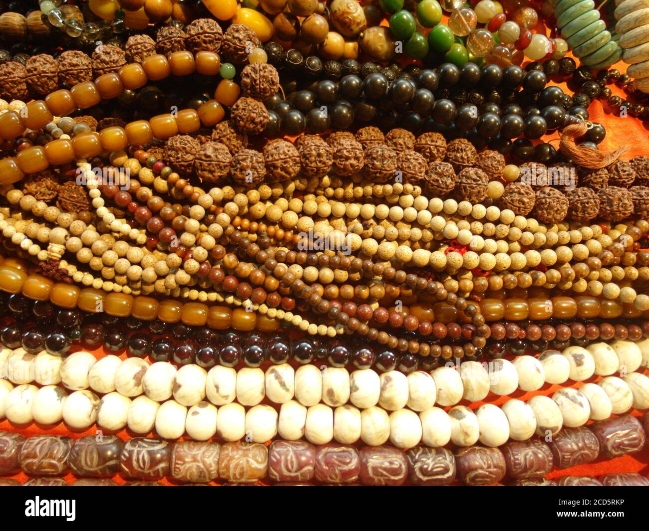 Closeup of handmade jewelry made of beads Stock Photo - Alamy