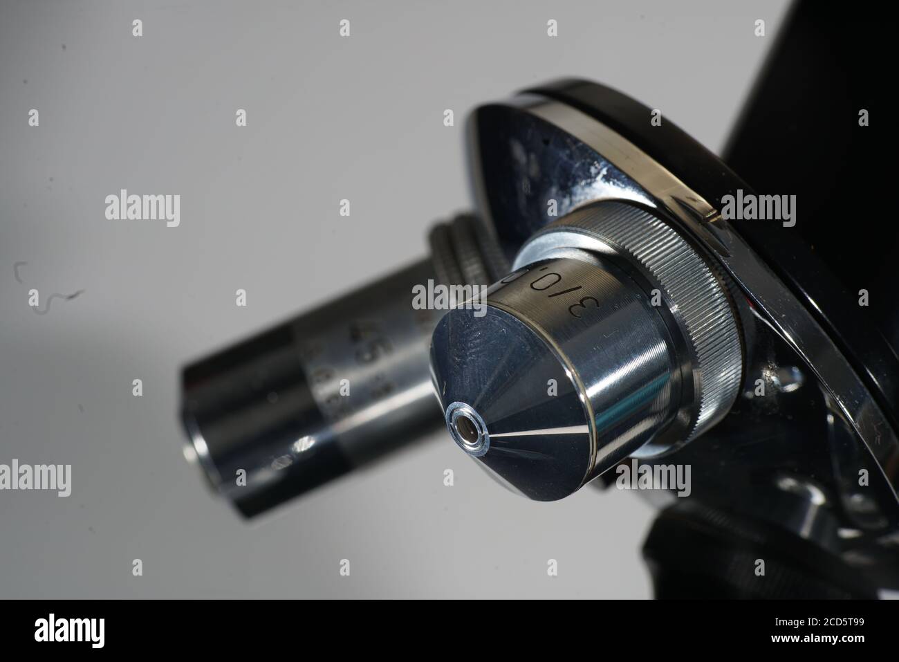 Old black microscope hi-res stock photography and images - Alamy
