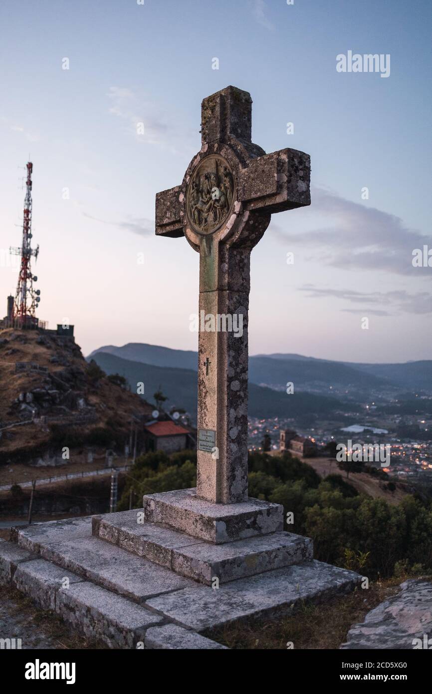 Statue of a stone cross on the hill Stock Photo - Alamy