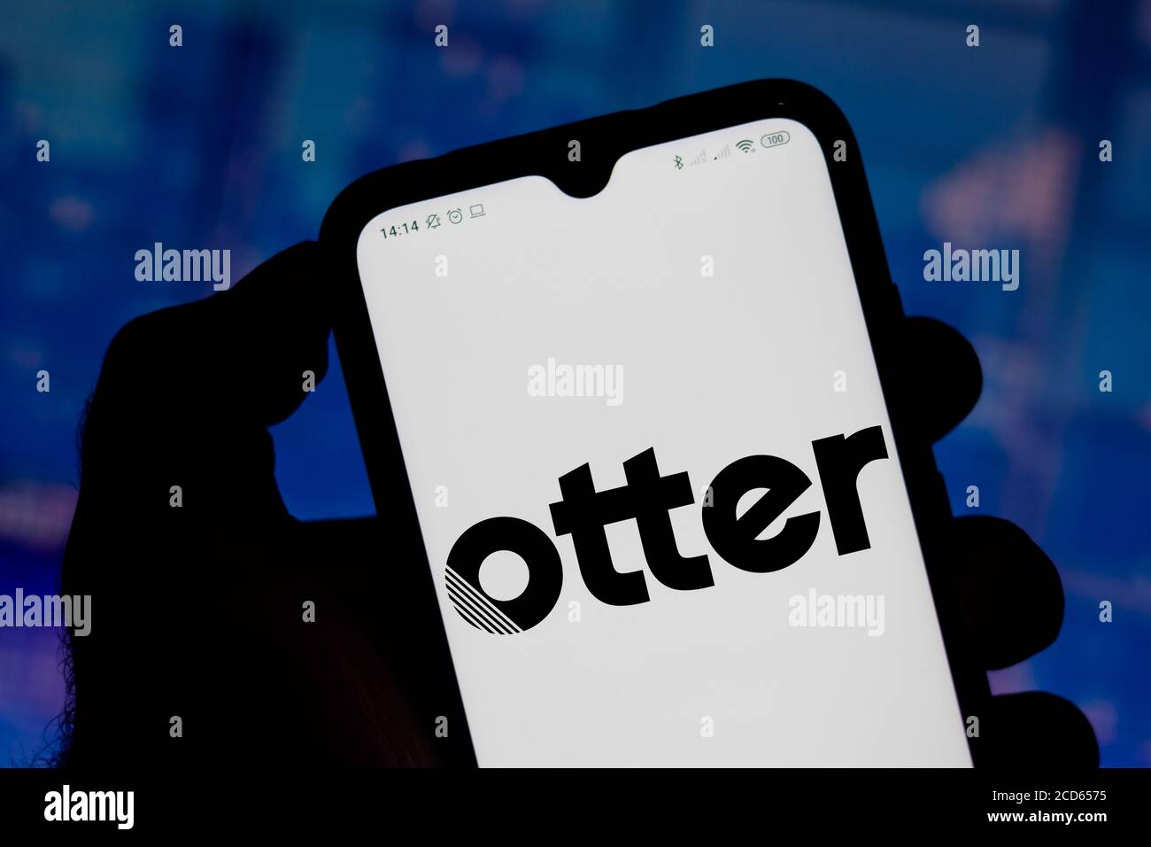 In this photo illustration the Otter Media Holdings logo seen displayed ...