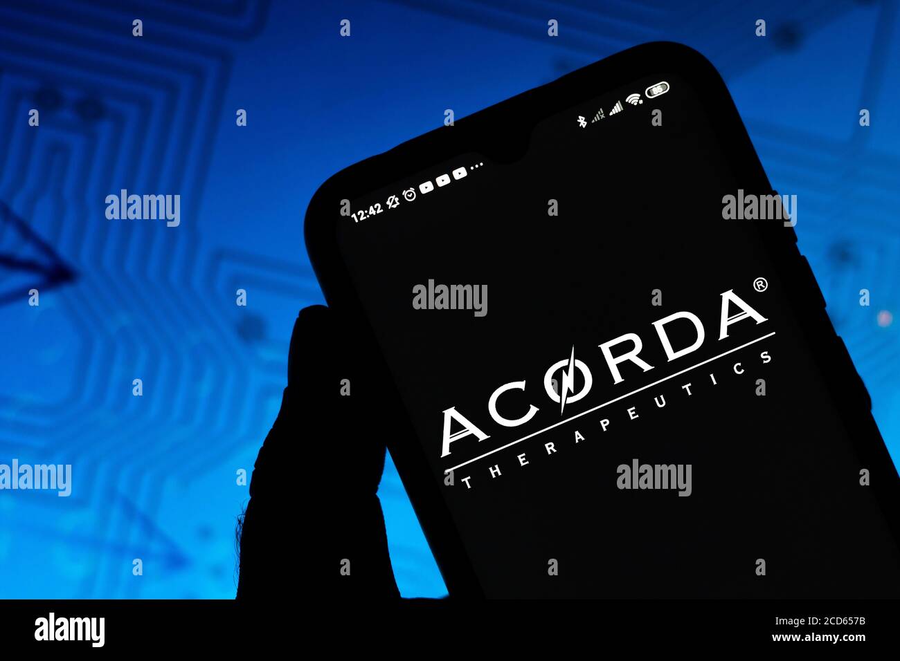 In this photo illustration the Acorda Therapeutics logo seen displayed on a smartphone Stock ...