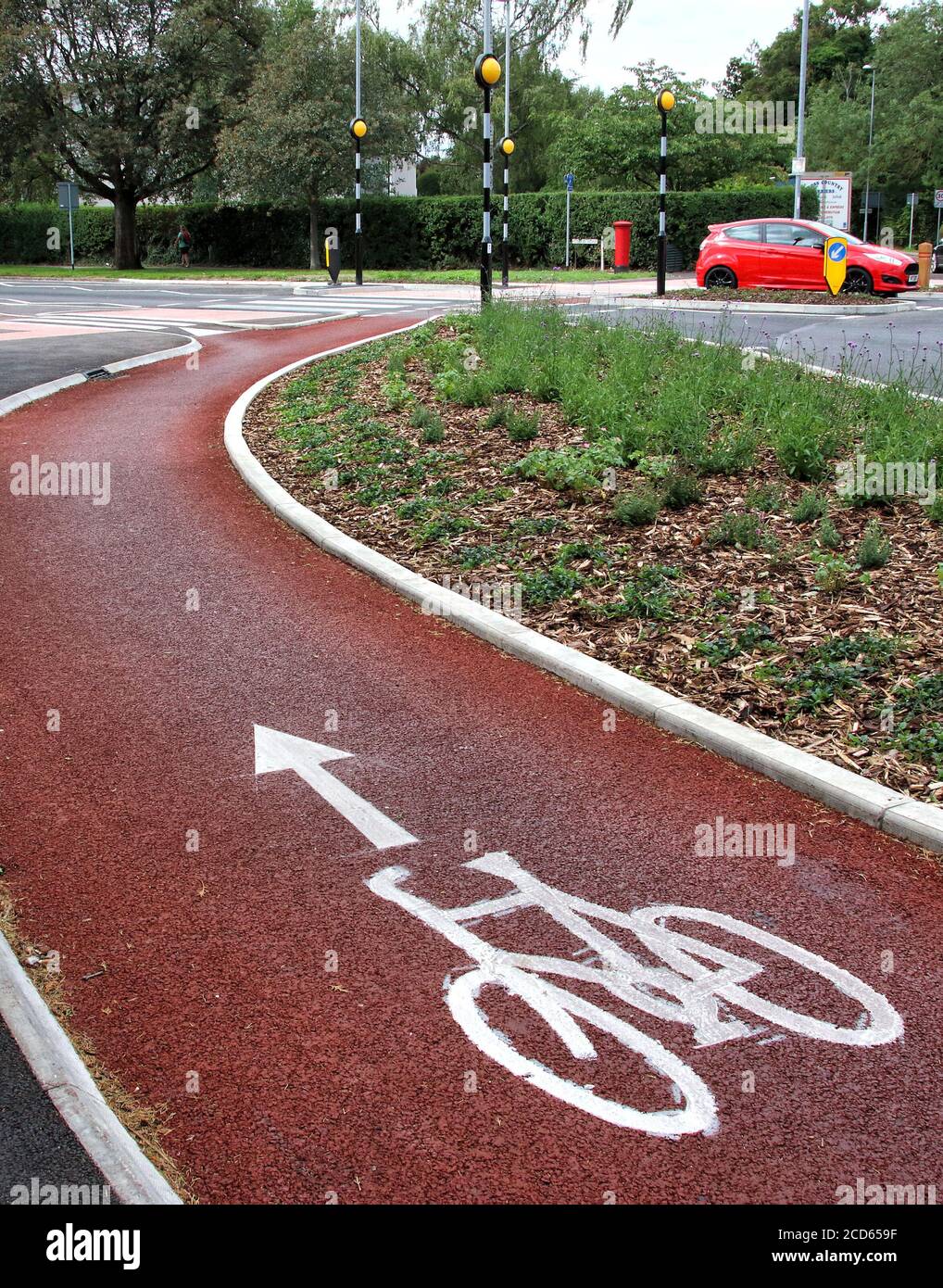 Cycle path marked on roundabout crossing.Britain's first Dutch-style ...