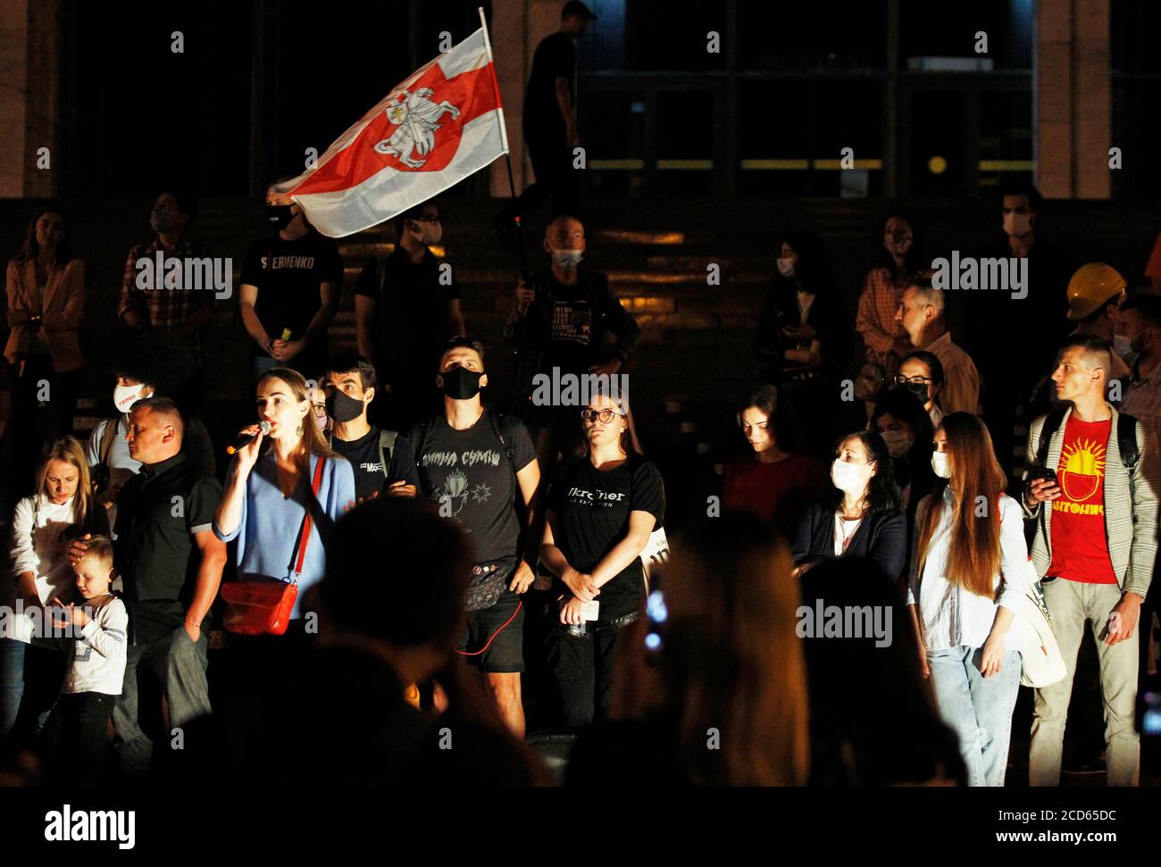 Protester waving the historical Belarusian flag during the ...