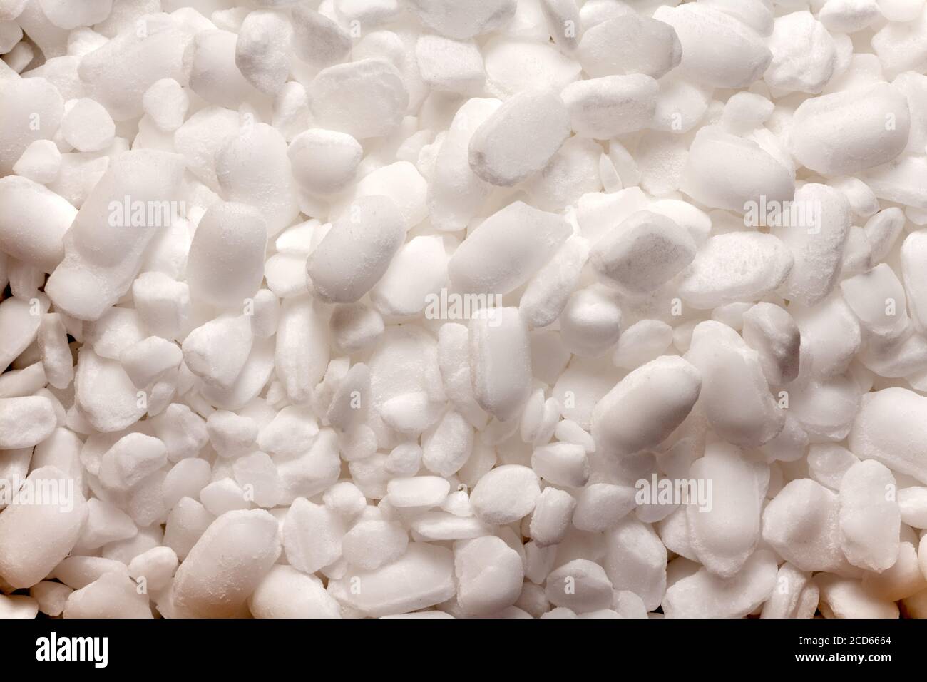 Macro shot of pellets of salt used for water softener Stock Photo - Alamy