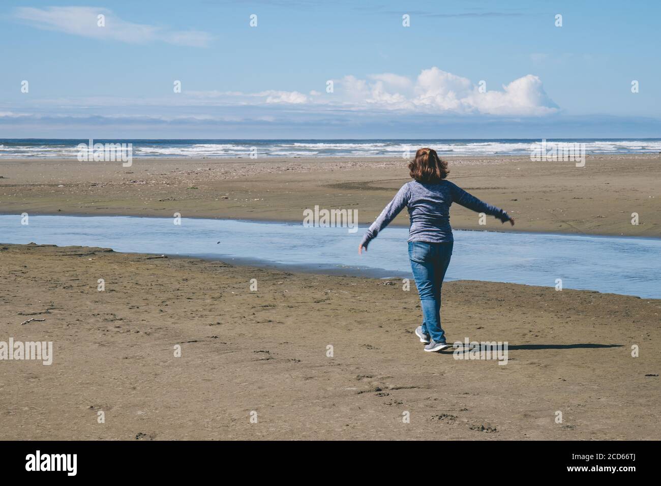 Woman walking alone hi-res stock photography and images - Alamy