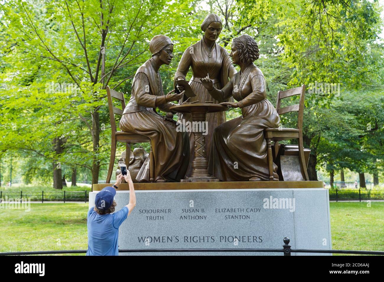 New York, USA. 26th Aug, 2020. A woman takes photos of the statue of ...
