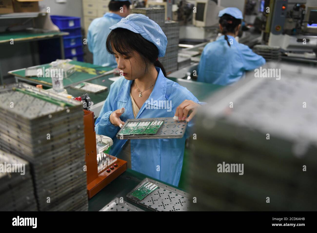 Nan'an, China's Fujian Province. 26th Aug, 2020. Workers make walkie ...