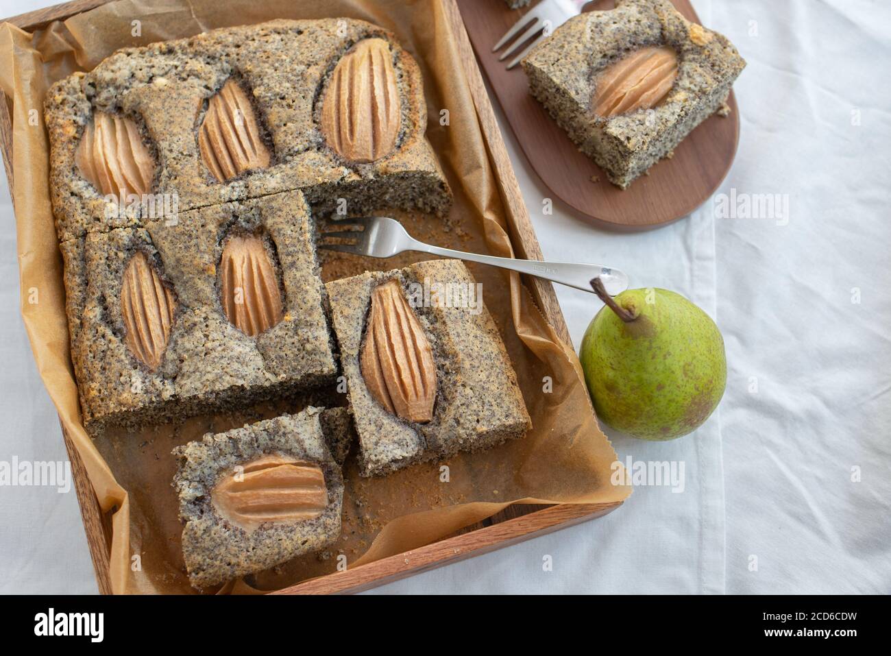 sweet home made poppy seed pie with fresh pears Stock Photo - Alamy