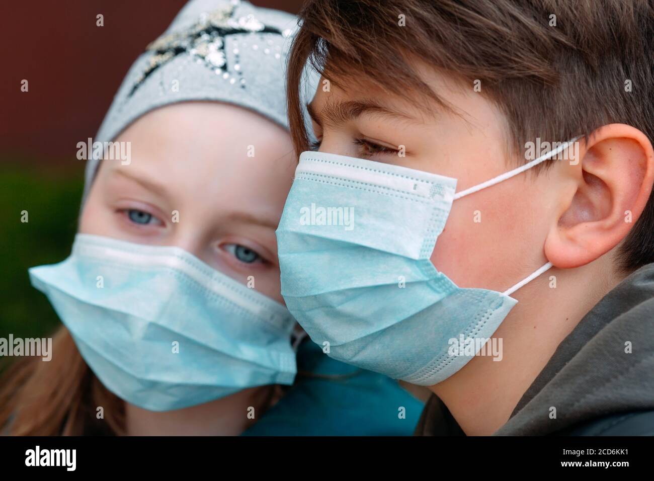 School-age children in medical masks. portrait of school children Stock ...