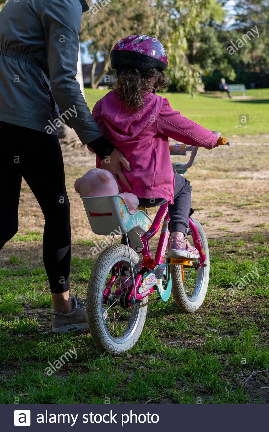 Learning To Ride A Bike High Resolution Stock Photography and Images ...