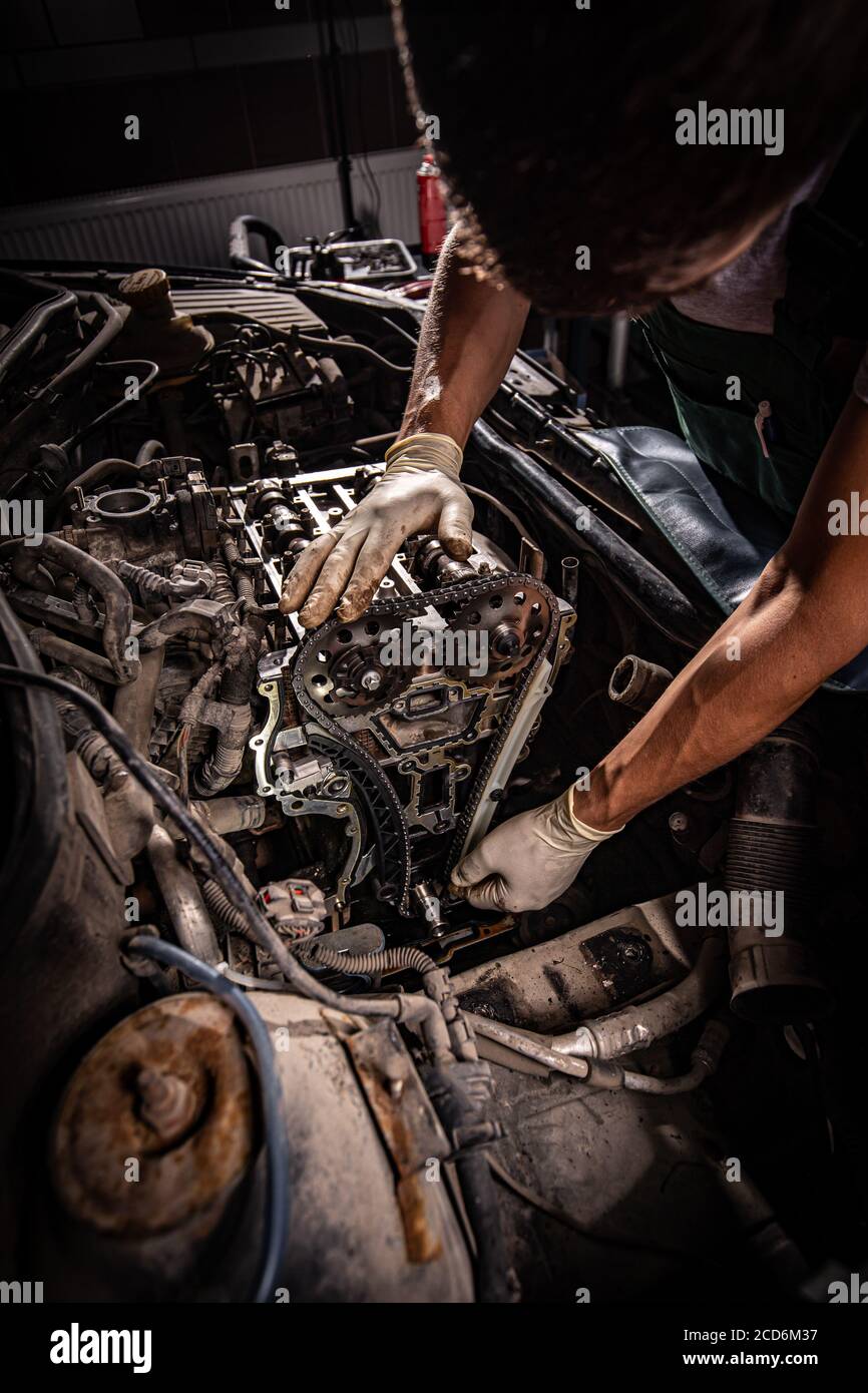 Repairing car at service station. Car repair concept Stock Photo - Alamy