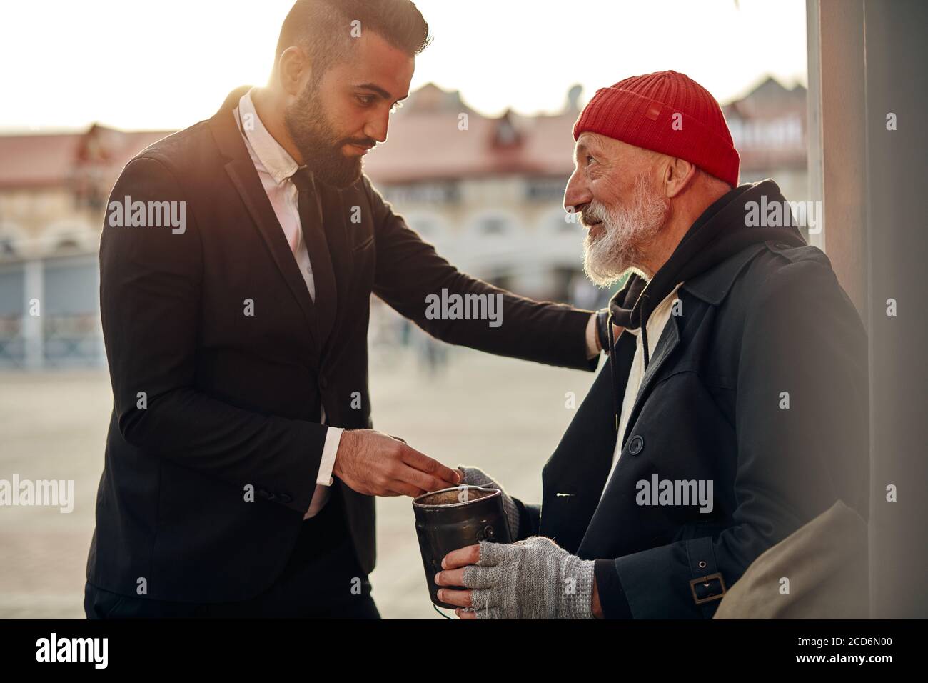 Old person hold up street hi-res stock photography and images - Alamy