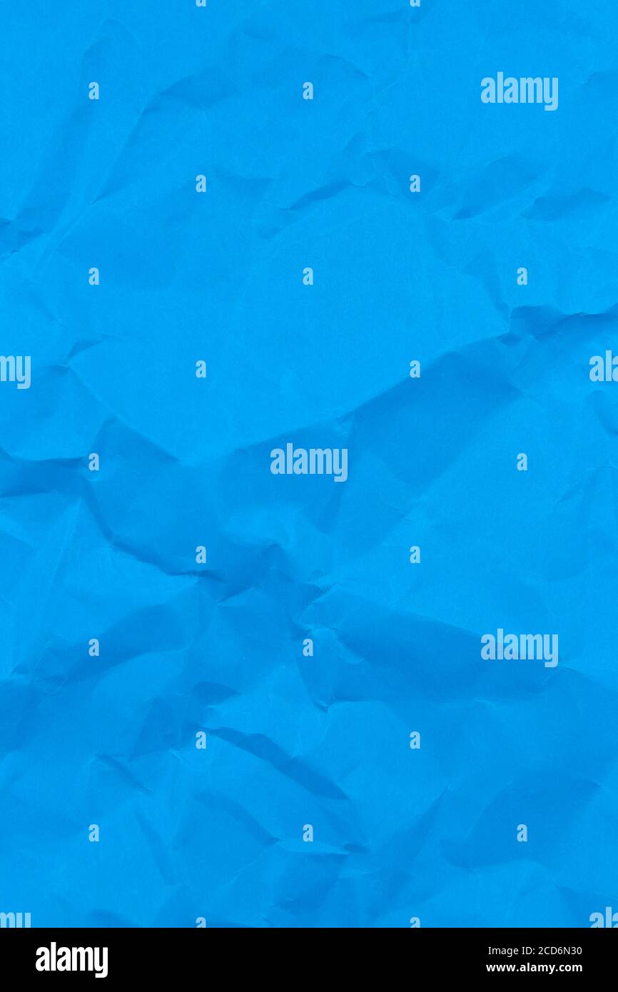 Textured crumpled blue paper background. Vertical Stock Photo - Alamy