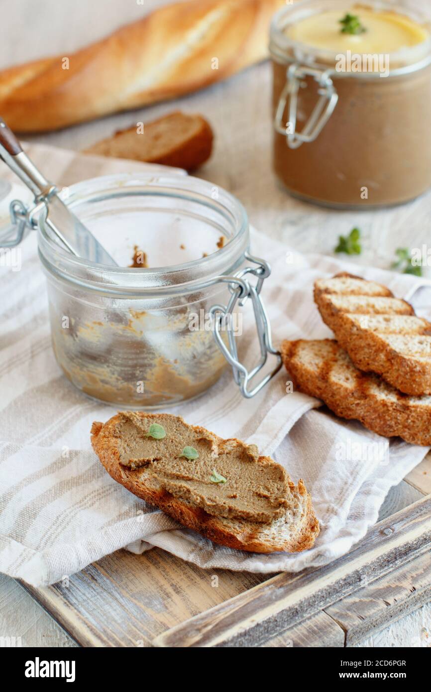 Making sandwiches with homemade pate on a table close up Stock Photo ...