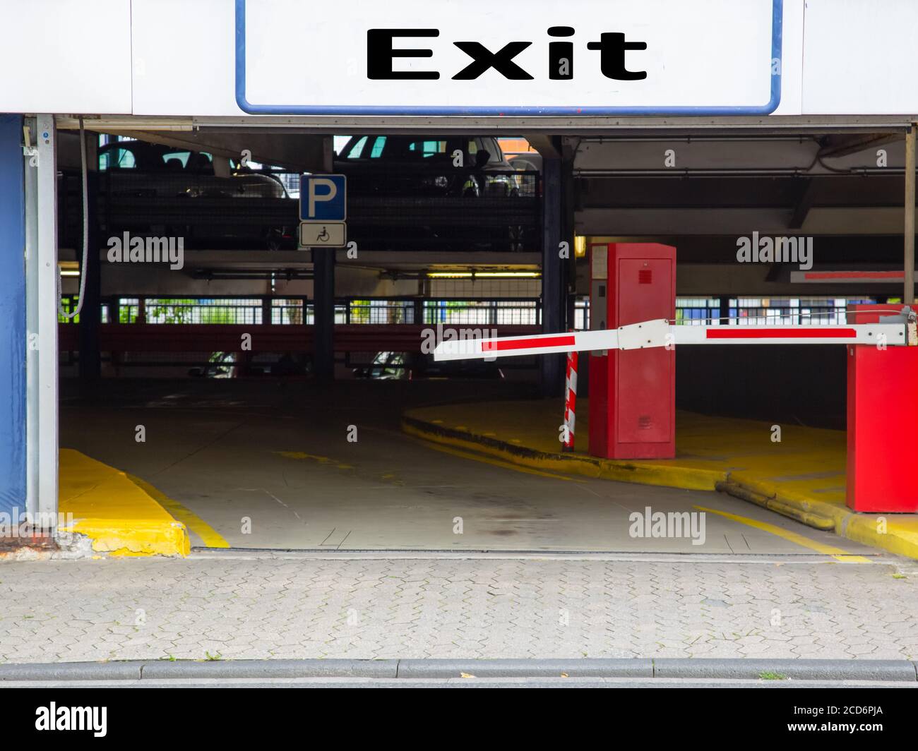 Barrier at the exit of a car parking garage with sign "Exit Stock Photo ...