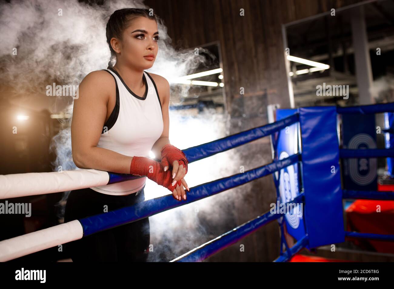 Woman standing in boxing ring hi-res stock photography and images - Alamy