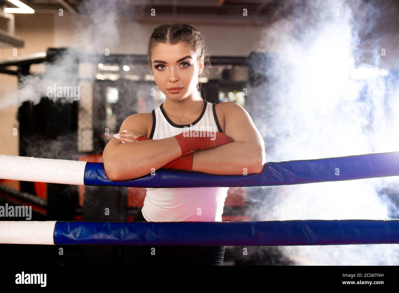 confident caucasian female boxer in sportive wear in ring, love boxing ...