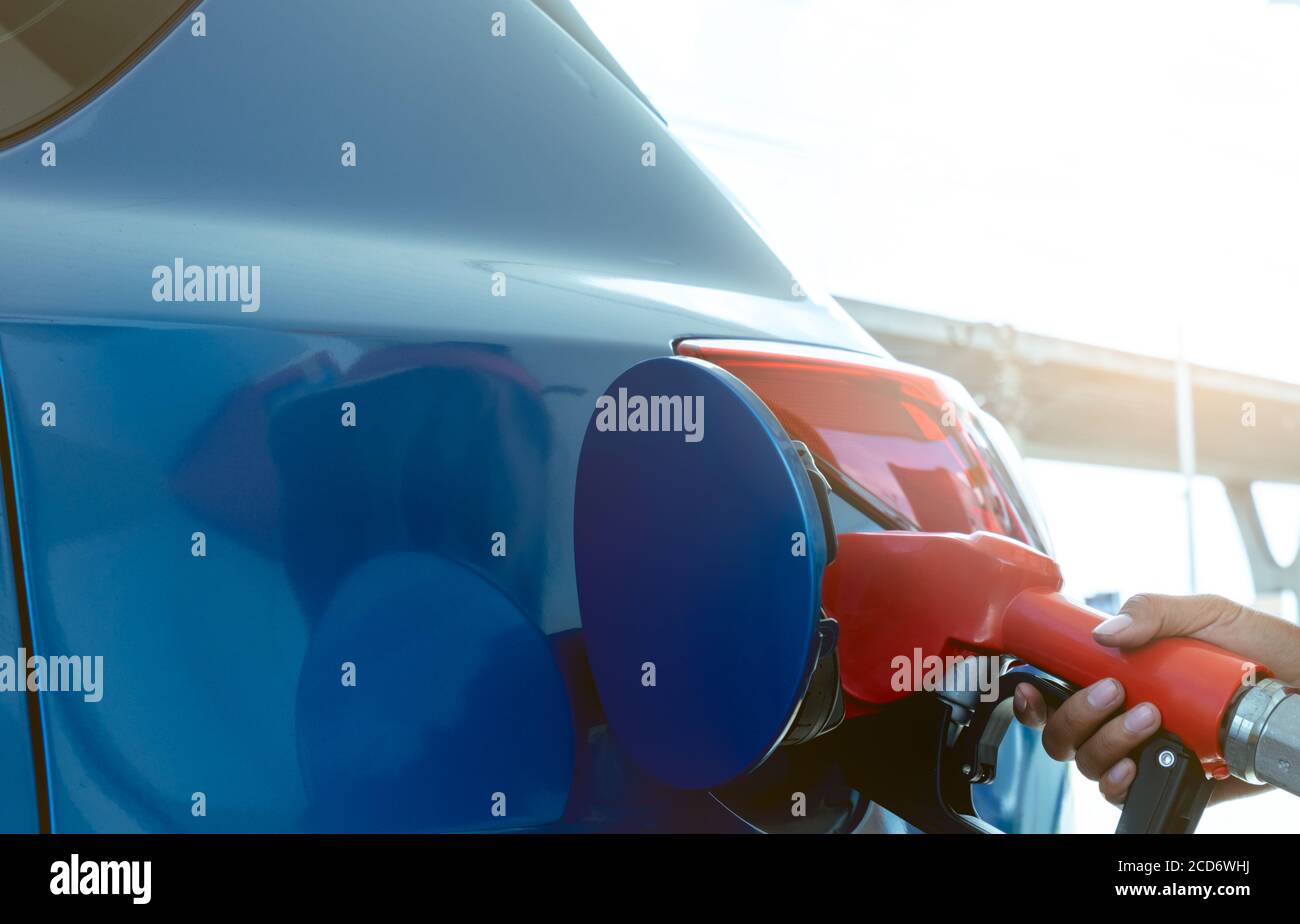 Car fueling at gas station. Refuel fill up with petrol gasoline. Petrol ...