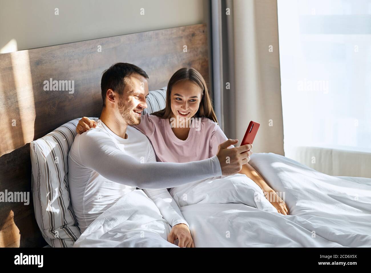 Putting hand on shoulder hi-res stock photography and images - Alamy