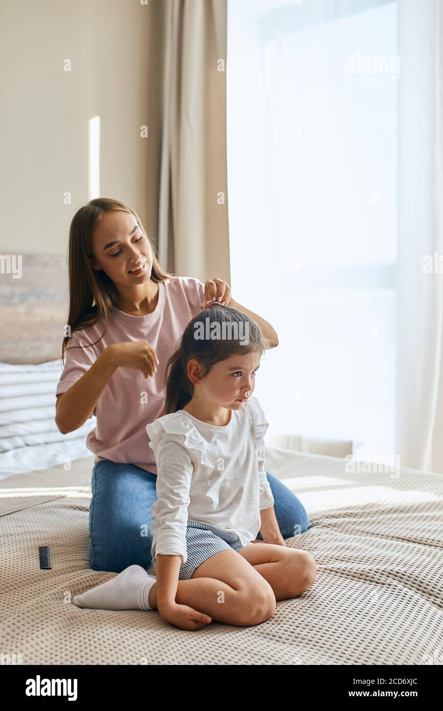Mother daughter satisfied pretty smile hi-res stock photography and ...