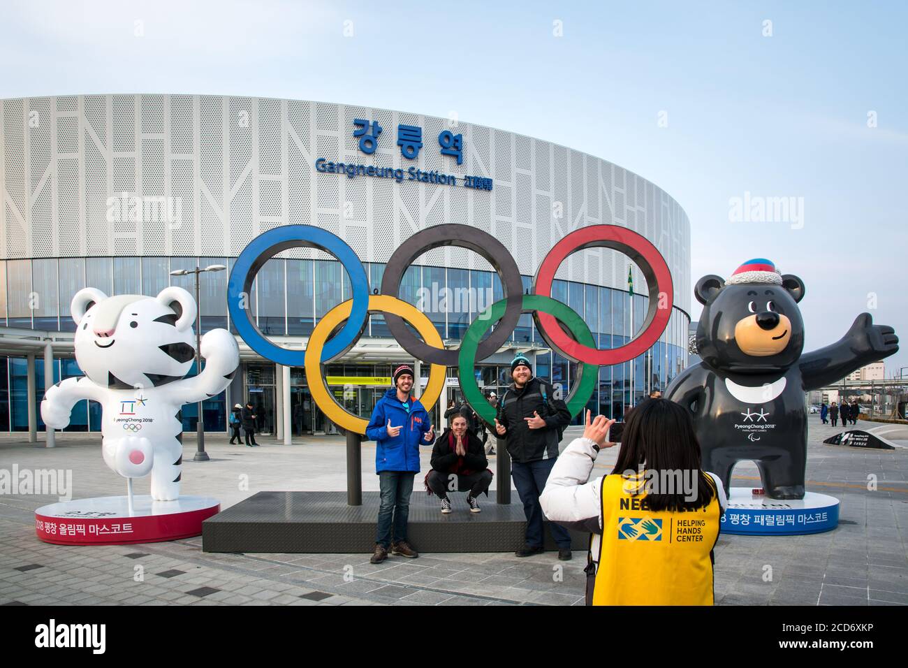 Gangneung, South Korea - Tourists posing for a picture with the Olympic ...