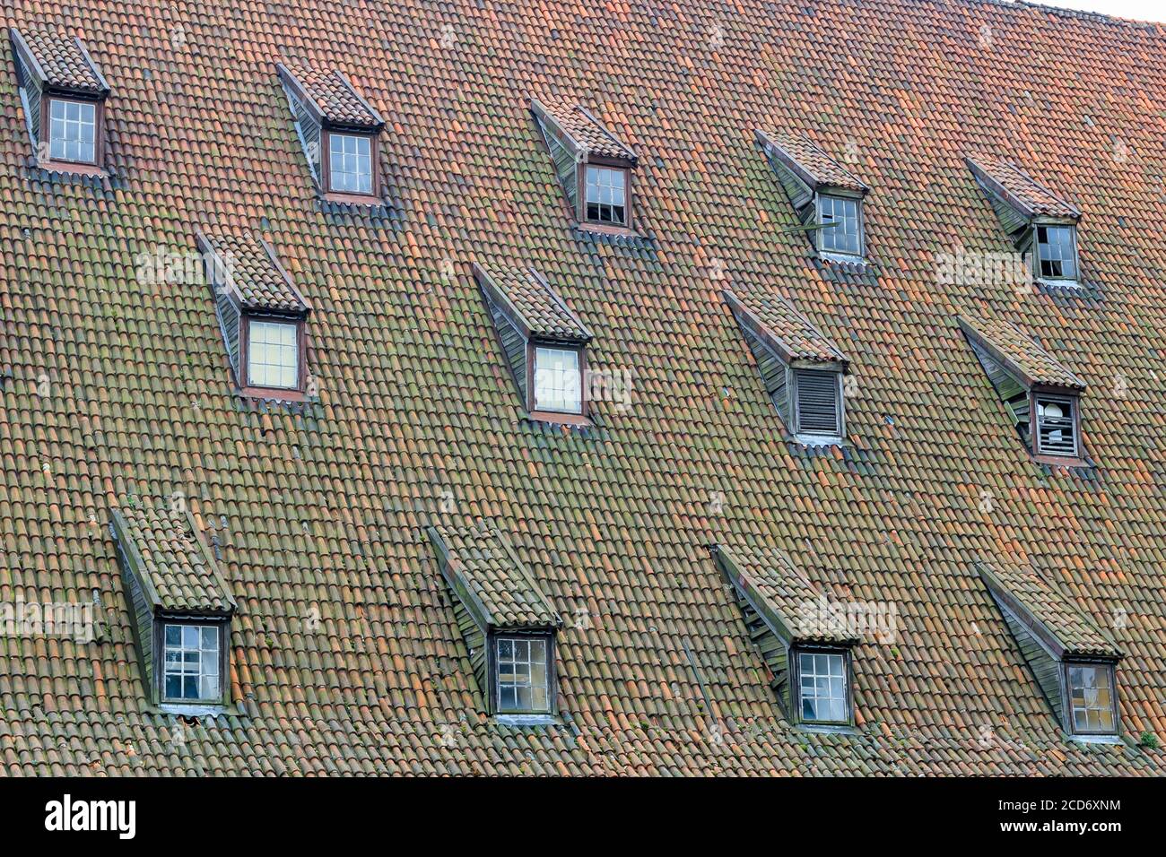 GDANSK, POLEN - 2017 AUGUST 26. Old roof with red roof tiles and ...