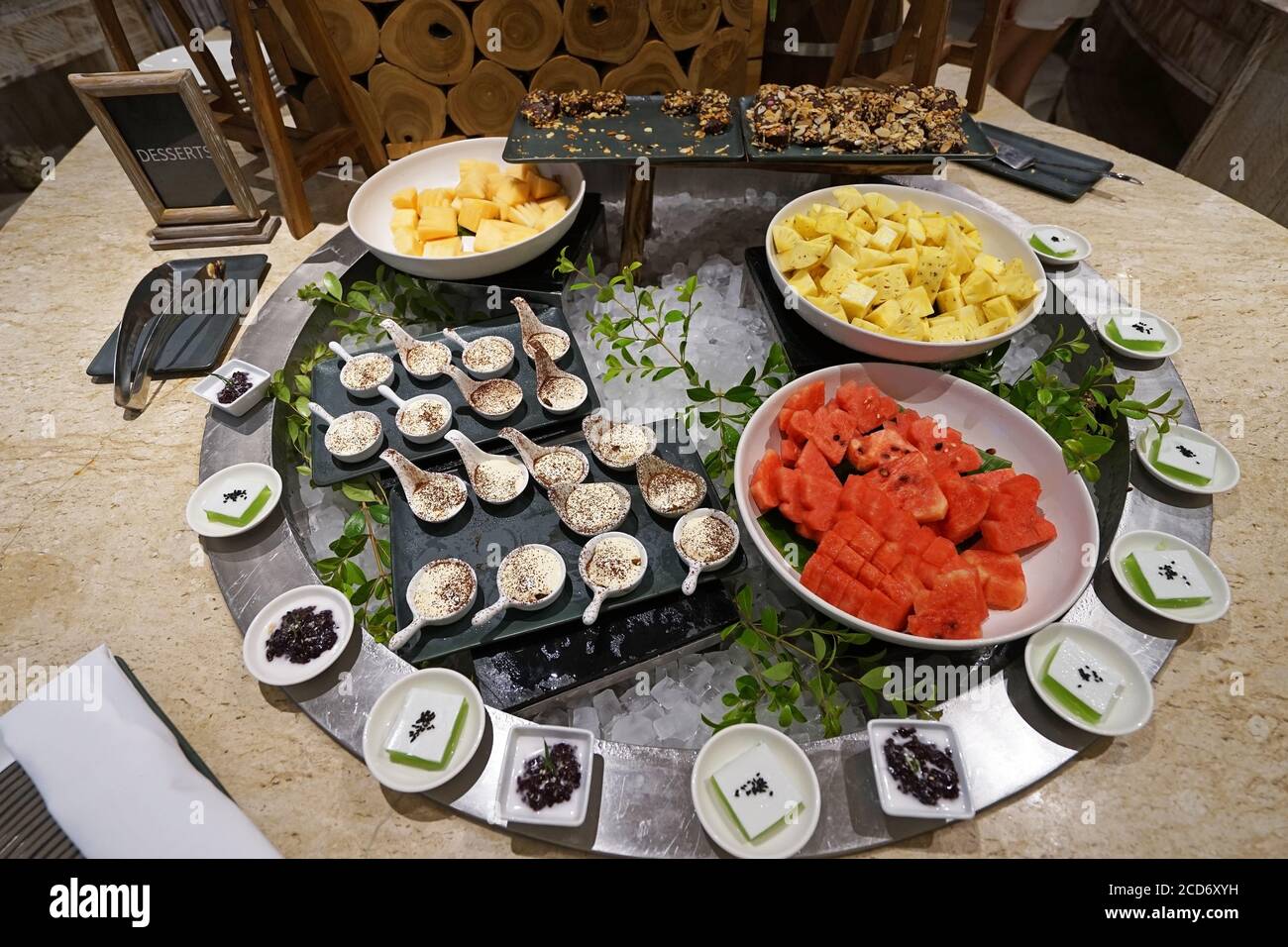 Buffet bar station of assorted fruits and desserts- watermelon ...