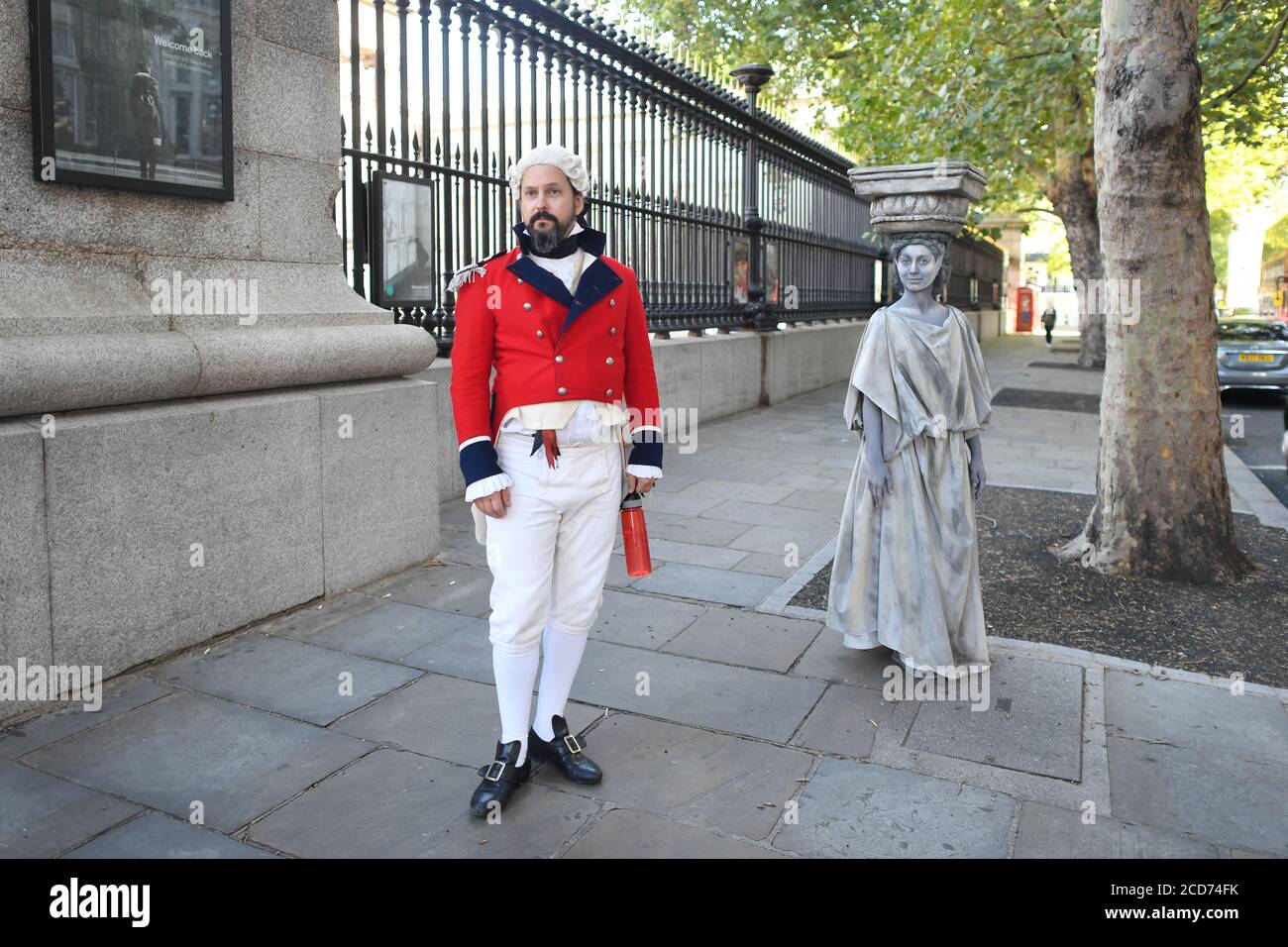Actors dressed up as Lord Elgin and one of the Parthenon sculptures ...