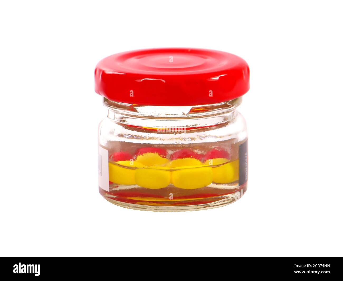 Jar of floating corn for fishing isolated on white Stock Photo - Alamy